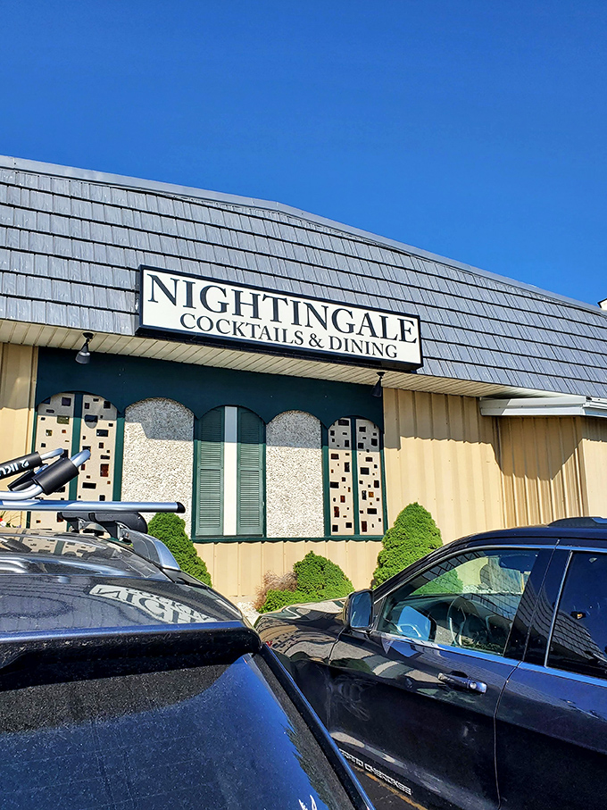 The Nightingale's distinctive shingled roof and vintage signage stand as a beacon for hungry travelers. Wisconsin's culinary treasures often hide in plain sight.