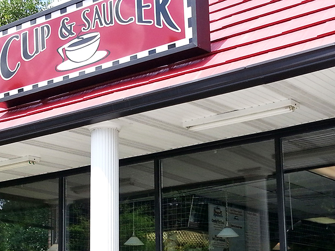 The bright red sign of Cup & Saucer stands like a beacon for hungry travelers adrift in a sea of chain restaurants in Loganville.