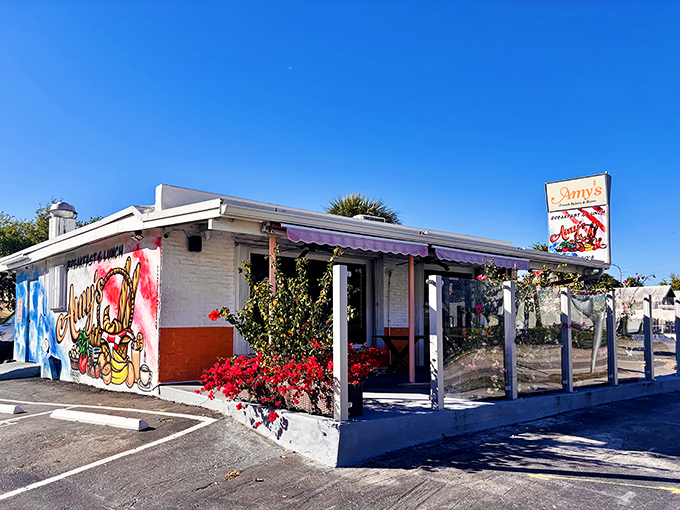 The unassuming exterior of Amy's French Bakery & Bistro proves that culinary treasures often hide in plain sight. That colorful mural hints at the vibrant flavors waiting inside.