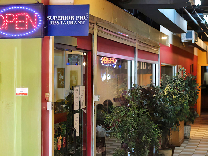 The unassuming storefront of Superior Pho might not stop traffic, but locals know this modest exterior hides culinary treasures worth seeking out.
