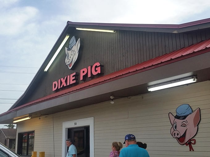 The winking cartoon pig on the sign isn't just cute&mdash;it's a promise of the smoky delights waiting inside this unassuming barbecue temple in Blytheville.