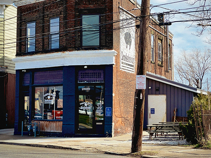The brick fortress of flavor stands proudly on Peach Street, its weathered sign promising smoky treasures within. A barbecue beacon in Erie's urban landscape.