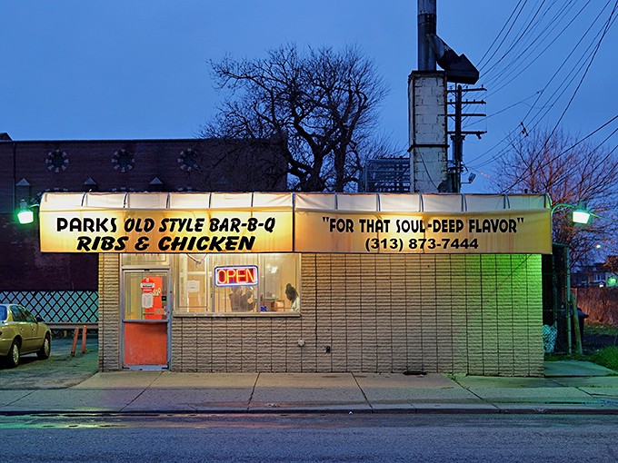 The neon-green glow along Gratiot Avenue marks a no-frills haven where Detroit&rsquo;s finest smoke-kissed barbecue awaits.
