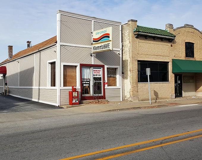 The iconic blue exterior of Klemm's Kafe stands like a beacon of breakfast hope on Wells Street, complete with a vintage Pepsi sign that's seen decades of hungry Hoosiers.