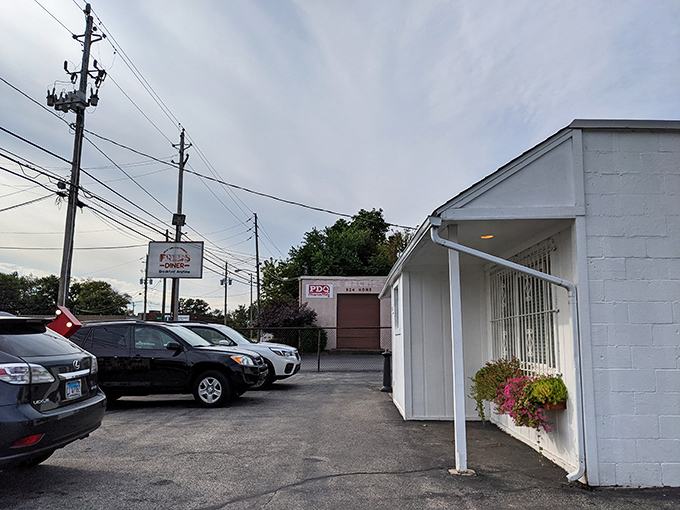 The unassuming white exterior of Fred's Diner stands like a culinary speakeasy &ndash; no flash, all substance, with flower baskets offering the only hint of the warmth inside.
