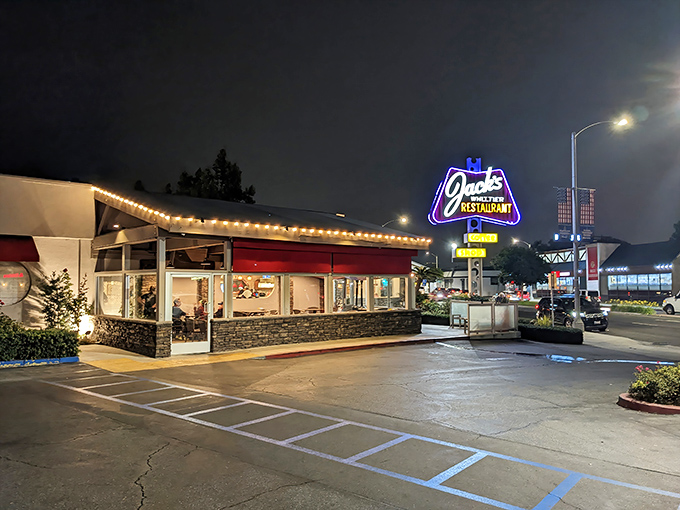 Jack's neon sign glows like a beacon in the night, promising comfort food salvation to weary travelers and hungry locals alike.