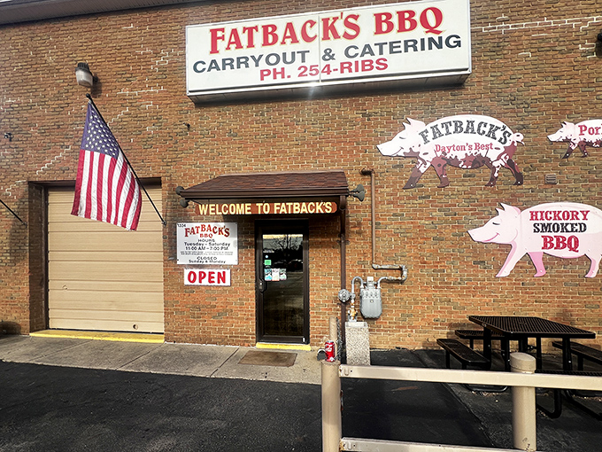 The brick fortress of flavor announces itself with no pretense&mdash;just pig silhouettes and an American flag promising patriotic levels of smoke and satisfaction.