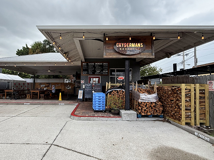 String lights and stacked firewood create that "we're serious about barbecue" ambiance that makes your stomach growl before you even reach the door.