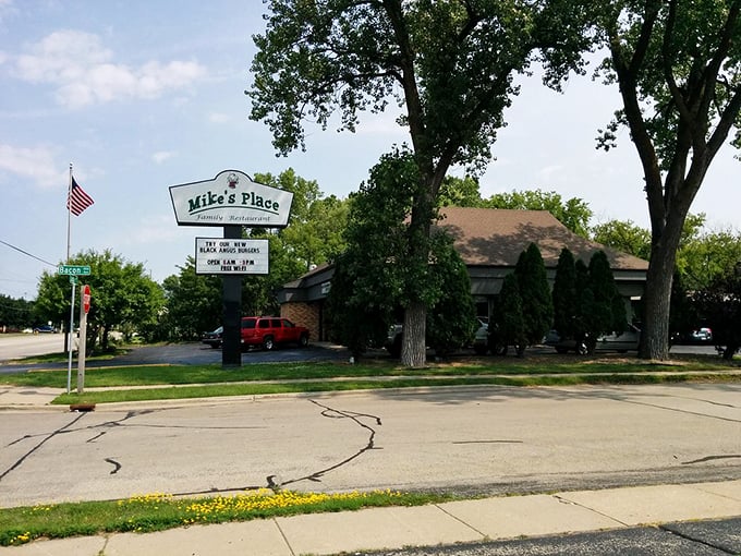 That classic roadside sign promises exactly what you'll find inside: honest-to-goodness family restaurant cooking that makes the drive to Oshkosh worthwhile.