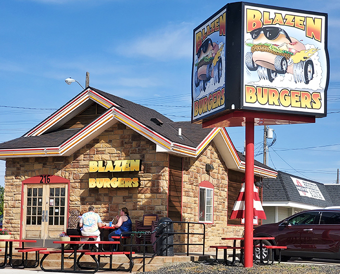 That iconic sign with a burger wearing sunglasses tells you everything you need to know&mdash;this place has serious food with a side of fun.