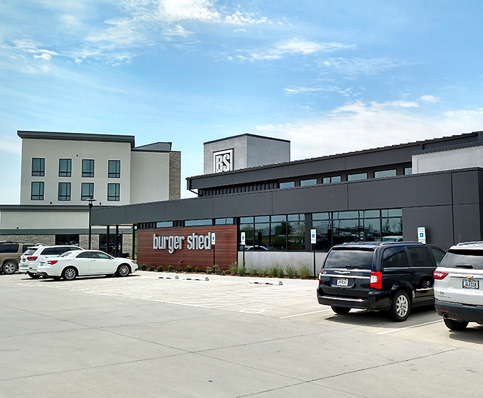 The sleek, modern exterior of Burger Shed stands out against the Iowa sky, promising burger nirvana within those stylish walls.