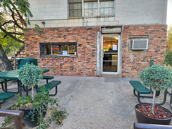 The unassuming brick exterior of Herd's might not scream "culinary landmark," but in Texas, the best burgers often hide in plain sight.