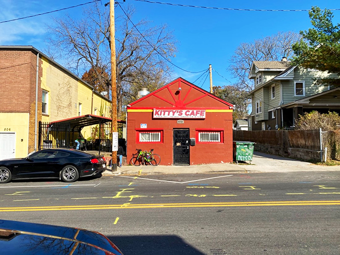 Kitty's vibrant exterior stands out like a beacon of sandwich hope, promising tenderloin treasures to those wise enough to stop.