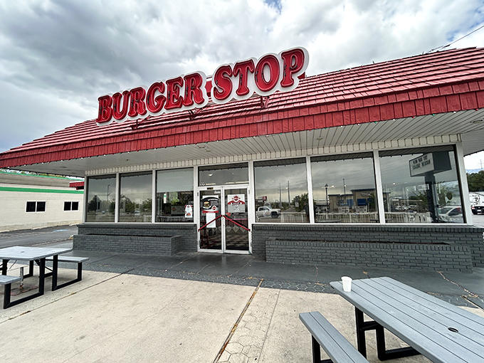 The iconic red roof of Burger Stop beckons like a lighthouse for the hungry, promising salvation from mediocre fast food in Layton.