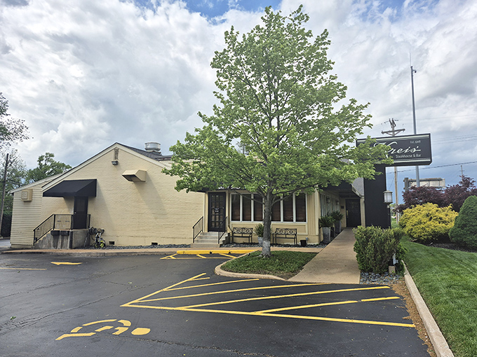 The unassuming exterior of Kreis' Steakhouse hides culinary treasures within, like finding a Rolex in a paper bag.