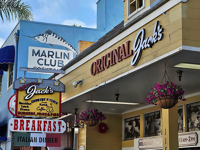 Where the Marlin Club meets morning magic: Jack's cheerful exterior stands out among Avalon's charming storefronts, a yellow lighthouse guiding hungry sailors to breakfast harbor.