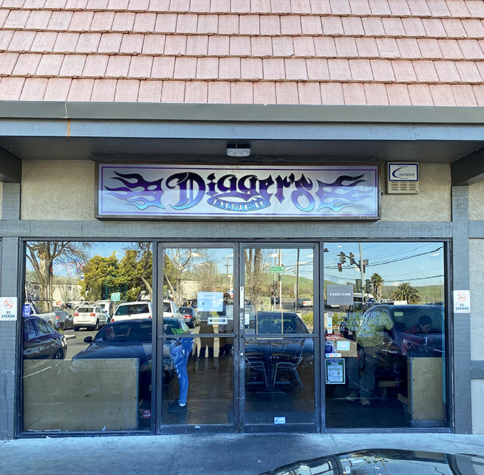 The flame-adorned sign beckons hungry travelers like a beacon of breakfast hope. Digger's Diner doesn't need fancy architecture when what's inside will blow your mind.