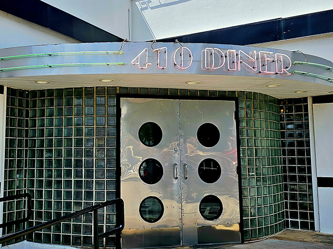 Those iconic metallic doors with porthole windows aren't just an entrance—they're a time machine to when diners were the cornerstone of American social life.