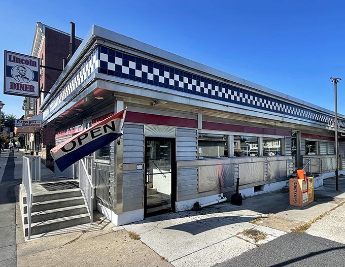 The classic checkerboard trim and "OPEN" signage of Lincoln Diner stands as a beacon of breakfast hope on Gettysburg's historic streets.