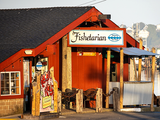 The bright orange exterior of Fishetarian stands like a delicious beacon against the Bodega Bay fog, promising seafood treasures within those weathered wooden walls.