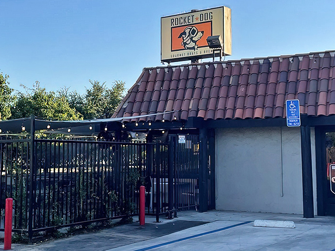 That terracotta-tiled roof isn't hiding a secret NASA facility, but something equally impressive: Fresno's temple to transcendent garlic fries and craft brats.