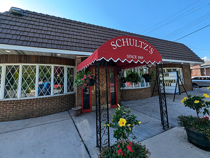 The iconic red awning of Schultz's beckons like a lighthouse for seafood lovers. This unassuming brick building houses Maryland treasure.