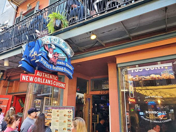 That jaunty crawfish on the sign isn't just waving&mdash;he's beckoning you into a French Quarter treasure where seafood dreams come true.
