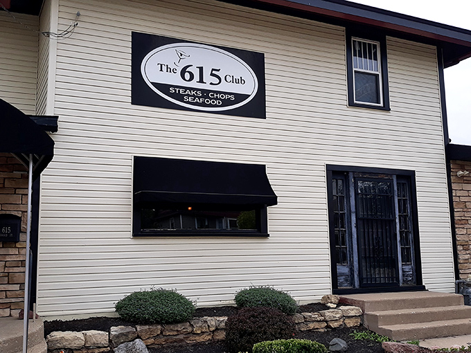 A humble façade conceals one of Wisconsin’s most beloved supper clubs, where classic comfort and timeless flavor meet behind every black awning.