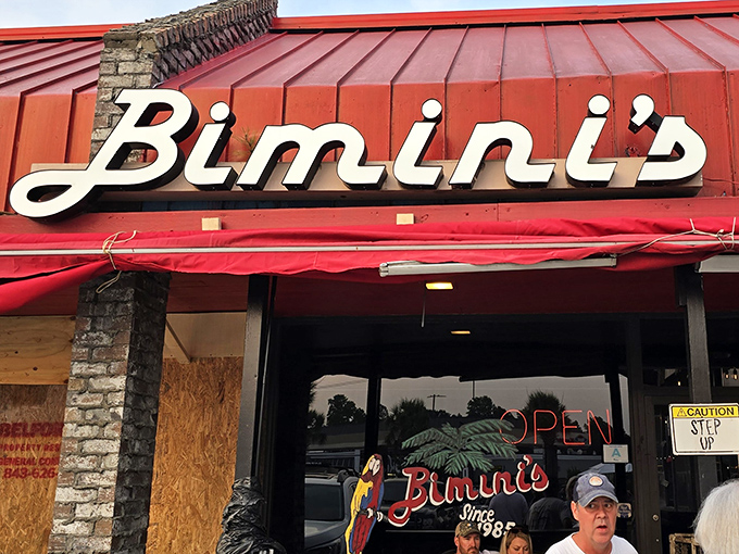 That iconic red roof and cursive sign &ndash; like a beacon calling to seafood lovers across Myrtle Beach. No fancy frills, just the promise of oceanic treasures inside.