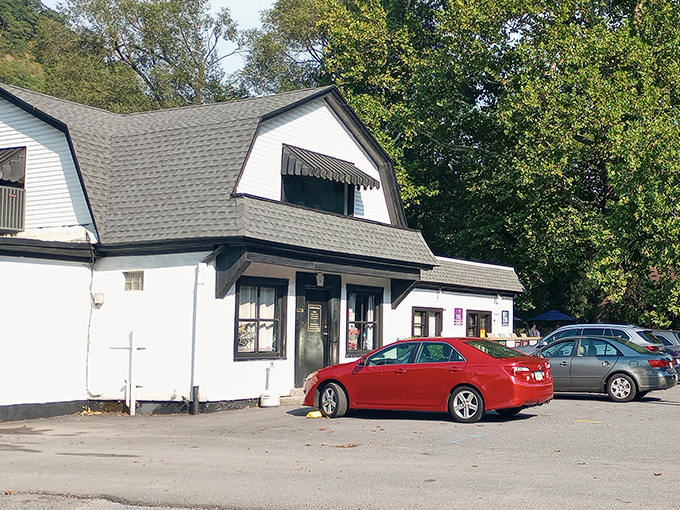 From the classic white siding to the modest entrance, The Glass Lounge isn't trying to impress you... until you taste what's inside.