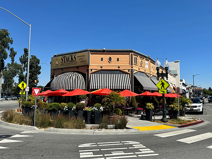 Stacks stands proudly on its Burlingame corner, those iconic black and white striped awnings practically screaming "breakfast paradise awaits inside!"