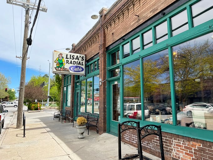 Lisa's Radial Cafe's charming brick exterior with its vintage sign promises breakfast magic in Omaha's Midtown neighborhood.