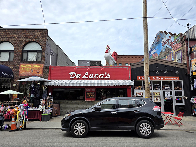 The iconic red storefront with its famous rooftop chicken &ndash; Pittsburgh's breakfast bat signal for those in the know. DeLuca's doesn't need fancy signage when the food speaks volumes.