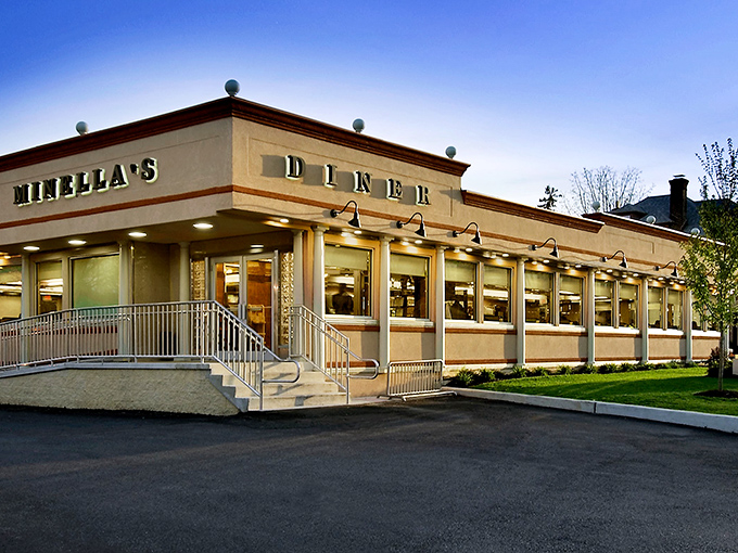 The classic diner silhouette of Minella's stands proudly on Lancaster Avenue, beckoning hungry travelers with its timeless charm and that unmistakable "Enter" sign.