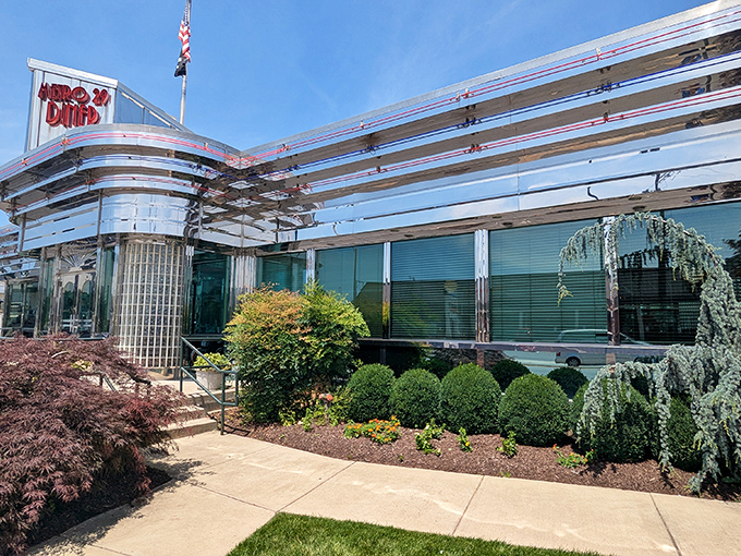 The gleaming stainless steel exterior of Metro 29 Diner stands like a time capsule of Americana, beckoning hungry travelers with its retro charm.