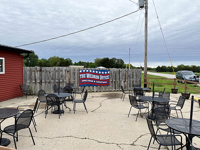 The unassuming red exterior of Wedron Office hides culinary treasures within. Like finding a Picasso at a yard sale, this place delivers unexpected delights.