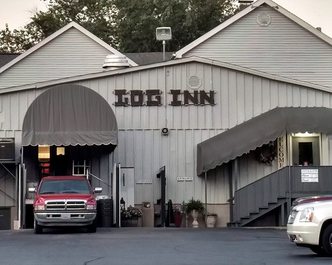 The unassuming exterior of The Log Inn might make you drive right past, but locals know this humble building houses culinary treasures worth stopping for. 