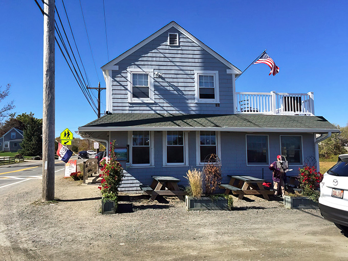 The unassuming blue exterior of J.T. Farnham's hides culinary treasures within, like a seafood speakeasy that everyone's somehow already discovered.