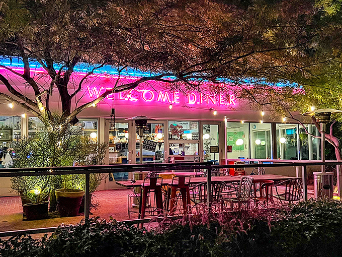 That pink neon glow isn't just a sign&mdash;it's a beacon calling to hungry souls across Phoenix, promising Southern comfort with Arizona flair.