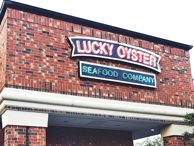 The iconic neon sign of Lucky Oyster glows like a beacon for seafood lovers, promising treasures from the deep in this Virginia Beach gem.