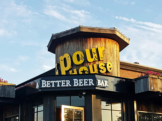 The iconic octagonal entrance of The Pour House stands proud against the blue sky, promising "A Better Beer Bar" and delivering on that pledge with gusto.