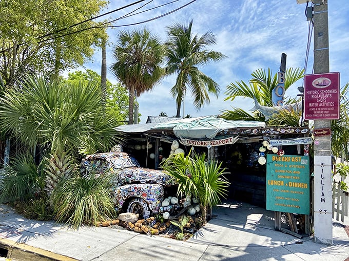 Paradise found! Bo's Fish Wagon looks like it survived a hurricane with nothing but character and palm trees intact.