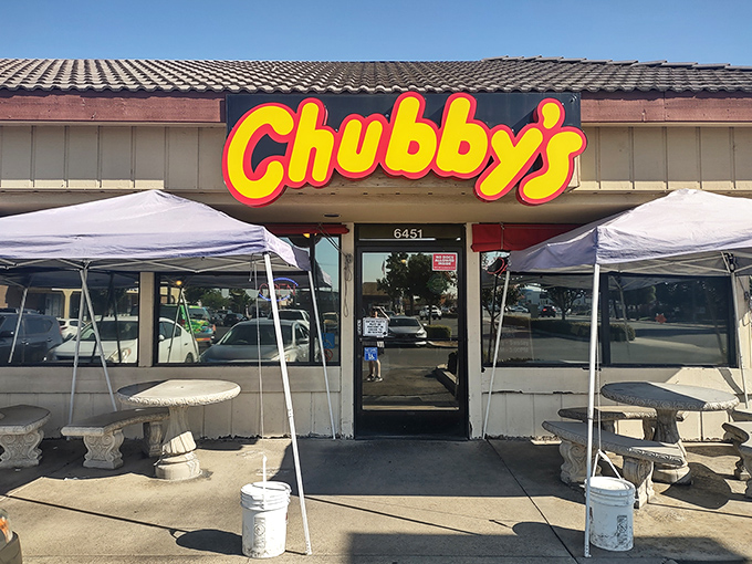 The bright yellow and red sign of Chubby's Diner beckons like a lighthouse for the hungry. No fancy frills, just the promise of honest-to-goodness comfort food.