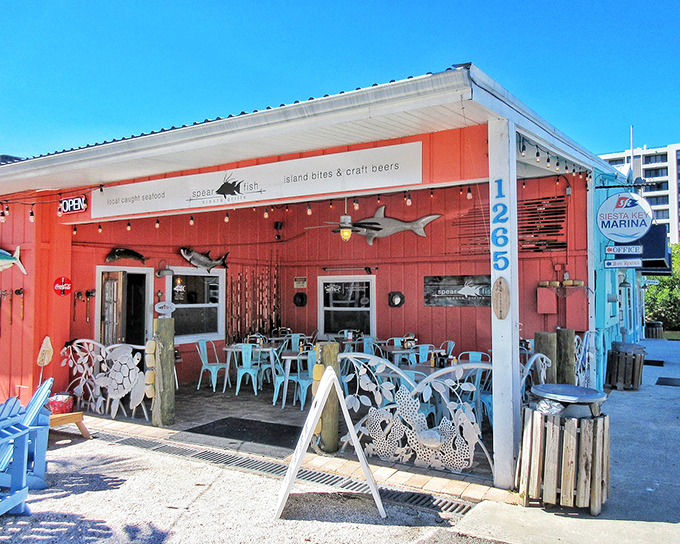 That coral-red exterior isn't trying to impress anyone, and that's exactly why it works so perfectly.