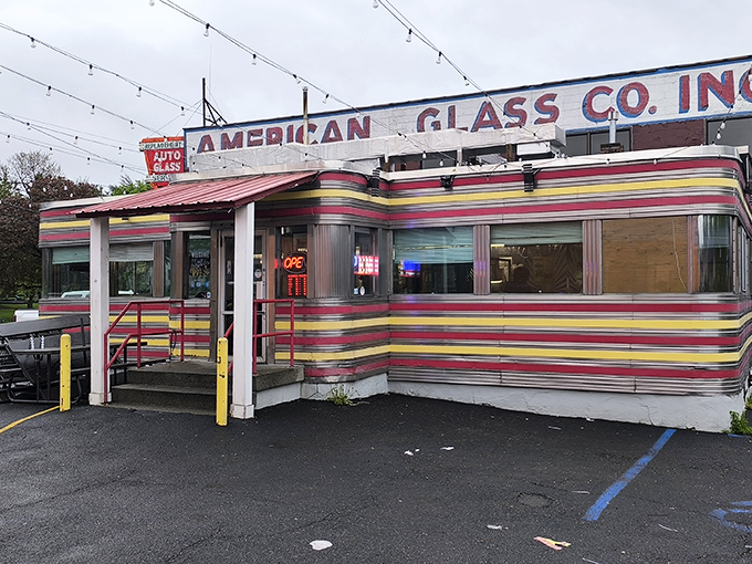 Jack's Diner's rainbow-striped exterior isn't just eye-catching&mdash;it's a time machine disguised as a building. Mid-century Americana at its finest!