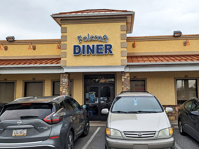 The unassuming yellow exterior of Folcroft Diner stands like a beacon of breakfast hope in Delaware County, promising comfort without pretension.