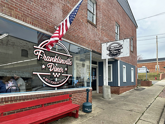 The red bench outside beckons like an old friend saying, "Come on in, the biscuits are warm and the coffee's hot."