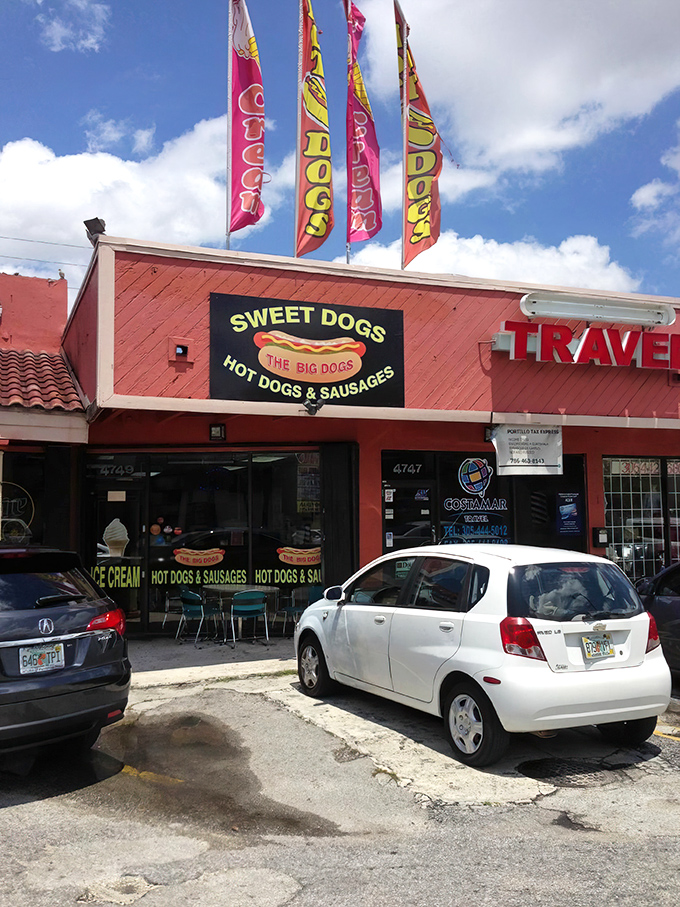 Those colorful flags aren't just decoration&mdash;they're semaphore signals to hungry Miamians that hot dog nirvana awaits within these humble walls.