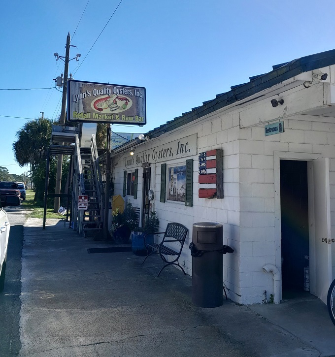 No fancy facade needed when what's inside is this good&mdash;just a straightforward sign promising "Quality Oysters" that delivers on every syllable.