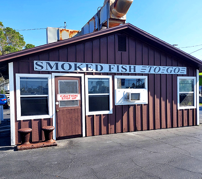 The unassuming brown wooden shack with "SMOKED FISH" boldly displayed is Florida's equivalent of finding Willie Wonka's chocolate factory disguised as a tool shed.